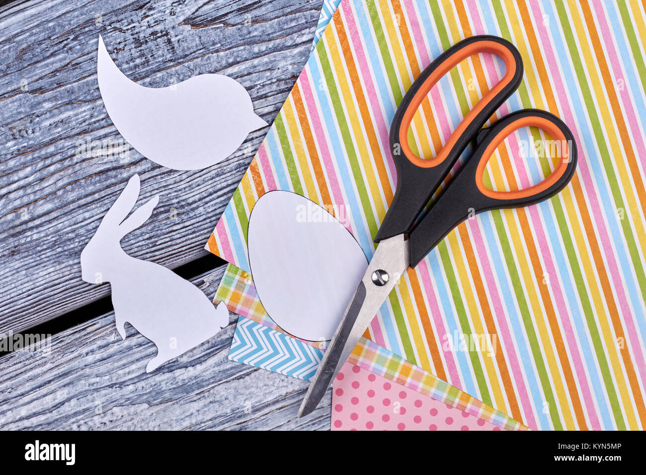 Patterned sheets of paper, scissors Stock Photo - Alamy