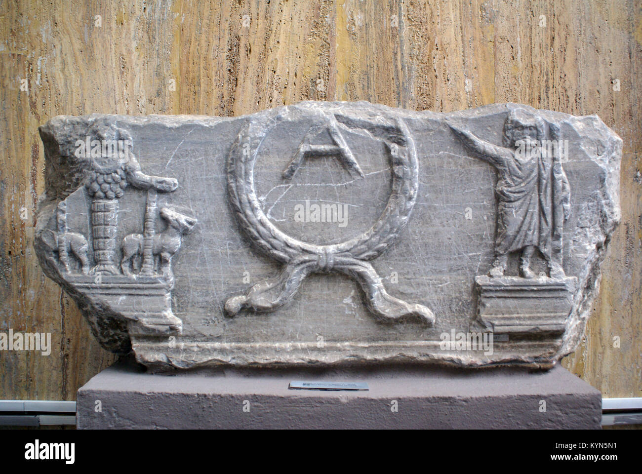 Artemis and man on the stone near wall Stock Photo - Alamy