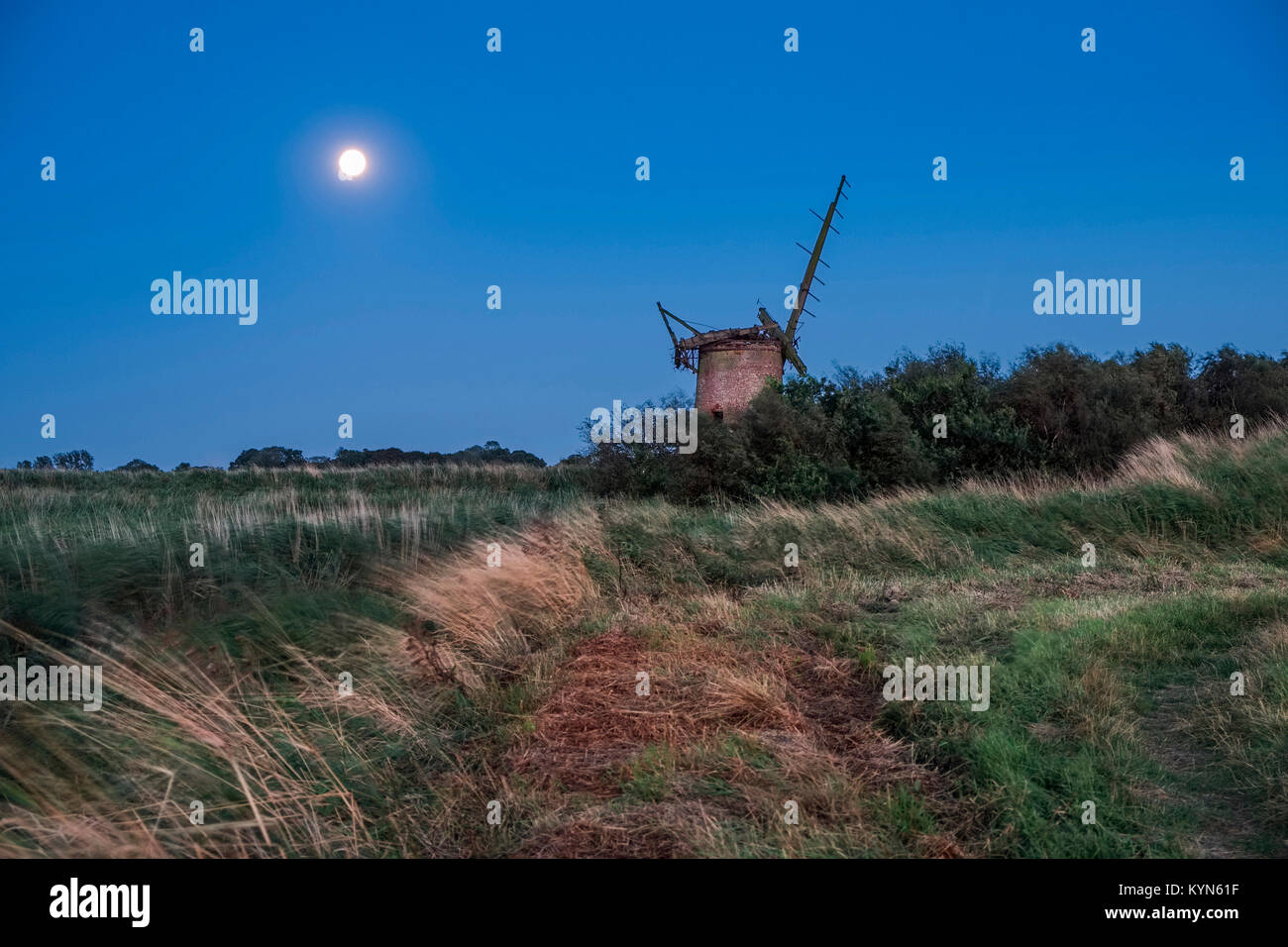 Full Moon rising over Brograve Mill - Norfolk Broads Stock Photo - Alamy