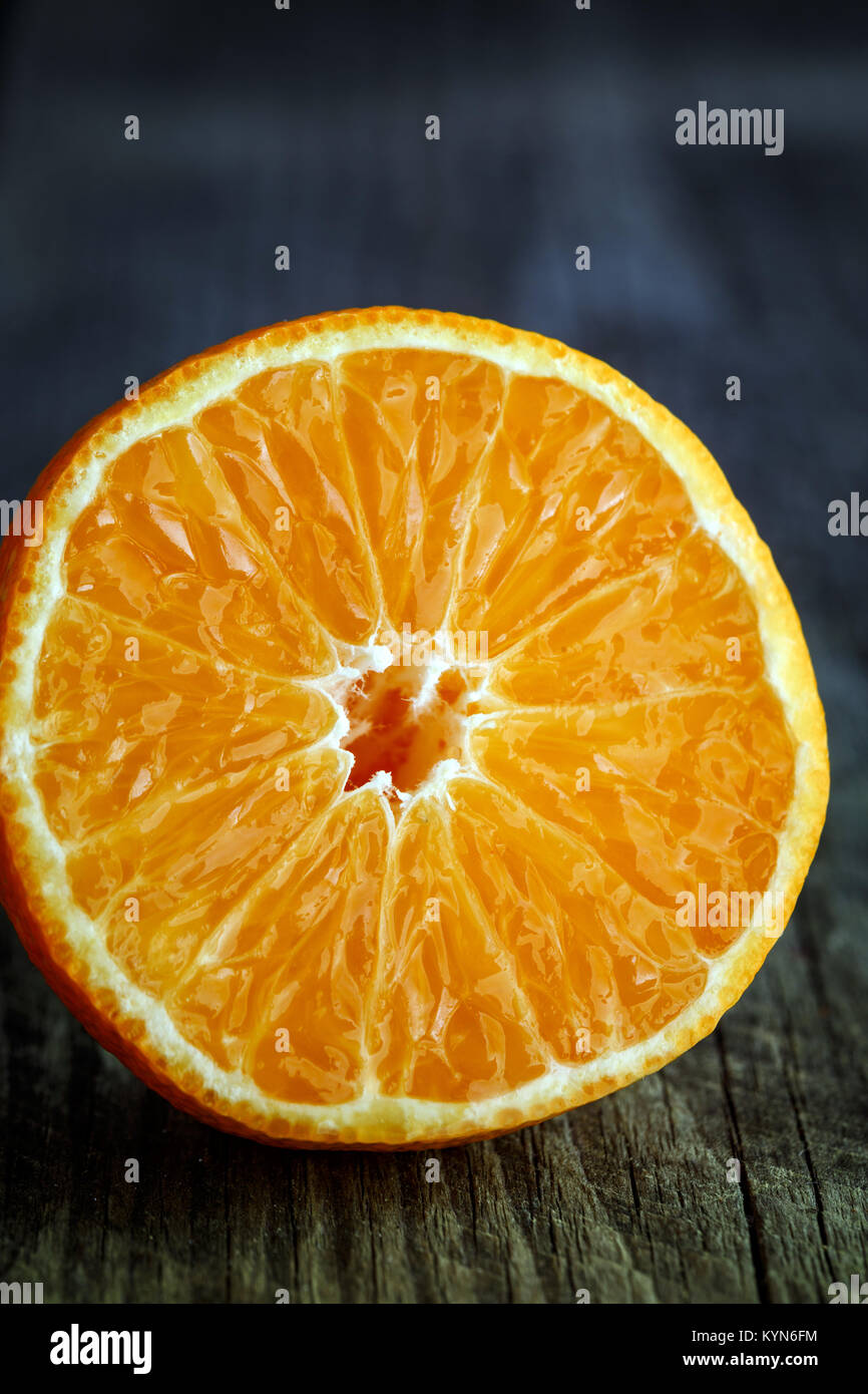 Ripe and juicy mandarin sliced in half Stock Photo - Alamy