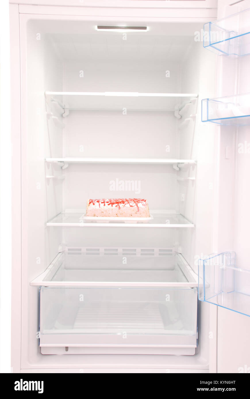 Delicious cake in refrigerator packed in plastic container. Fresh sweet ...