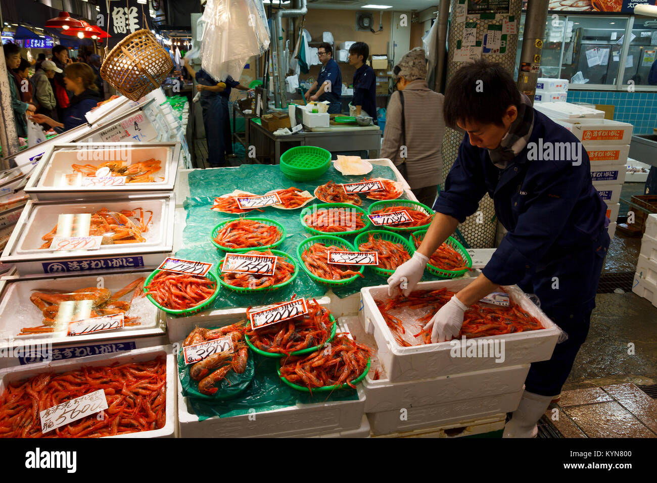 Japanese market with fresh fish and seafood on sale in the city of ...