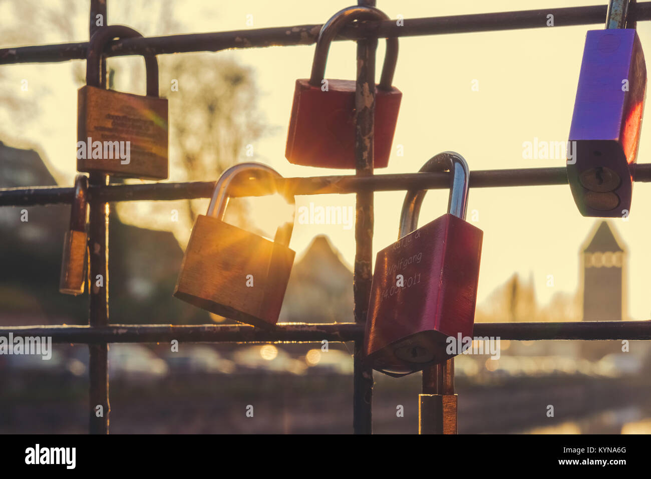 Some love locks attached to the metal grid of a bridge, Strasbourg ...
