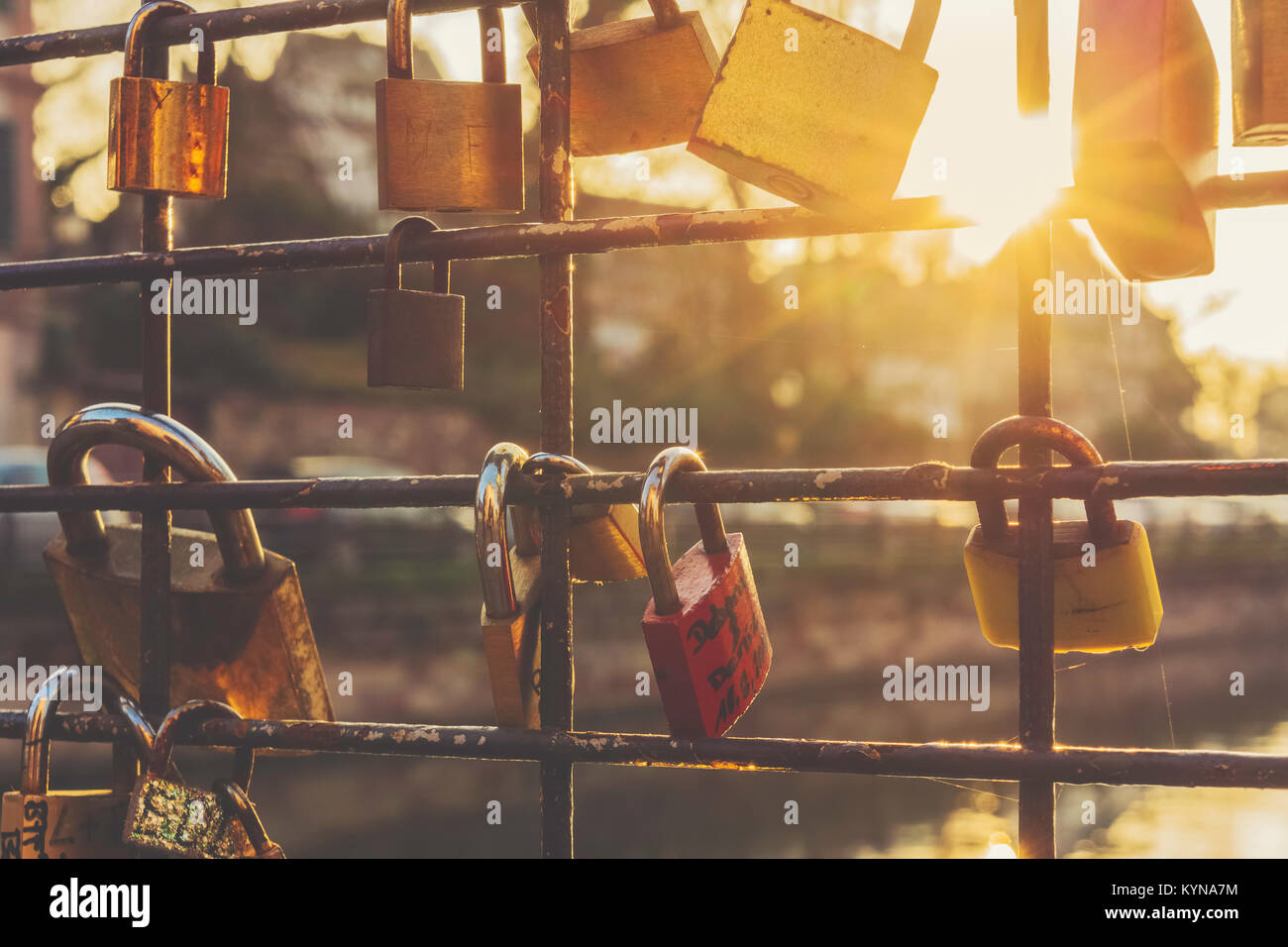 Some love locks attached to the metal grid of a bridge, Strasbourg ...