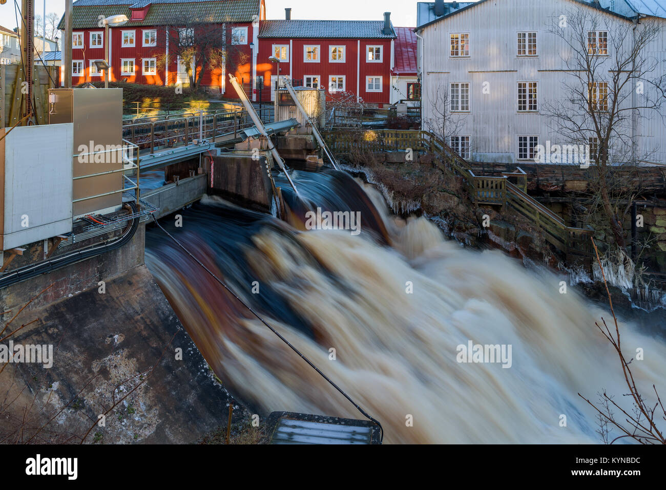 Open flood gates at the city waterfall In Ronneby, Sweden. Flooding ...