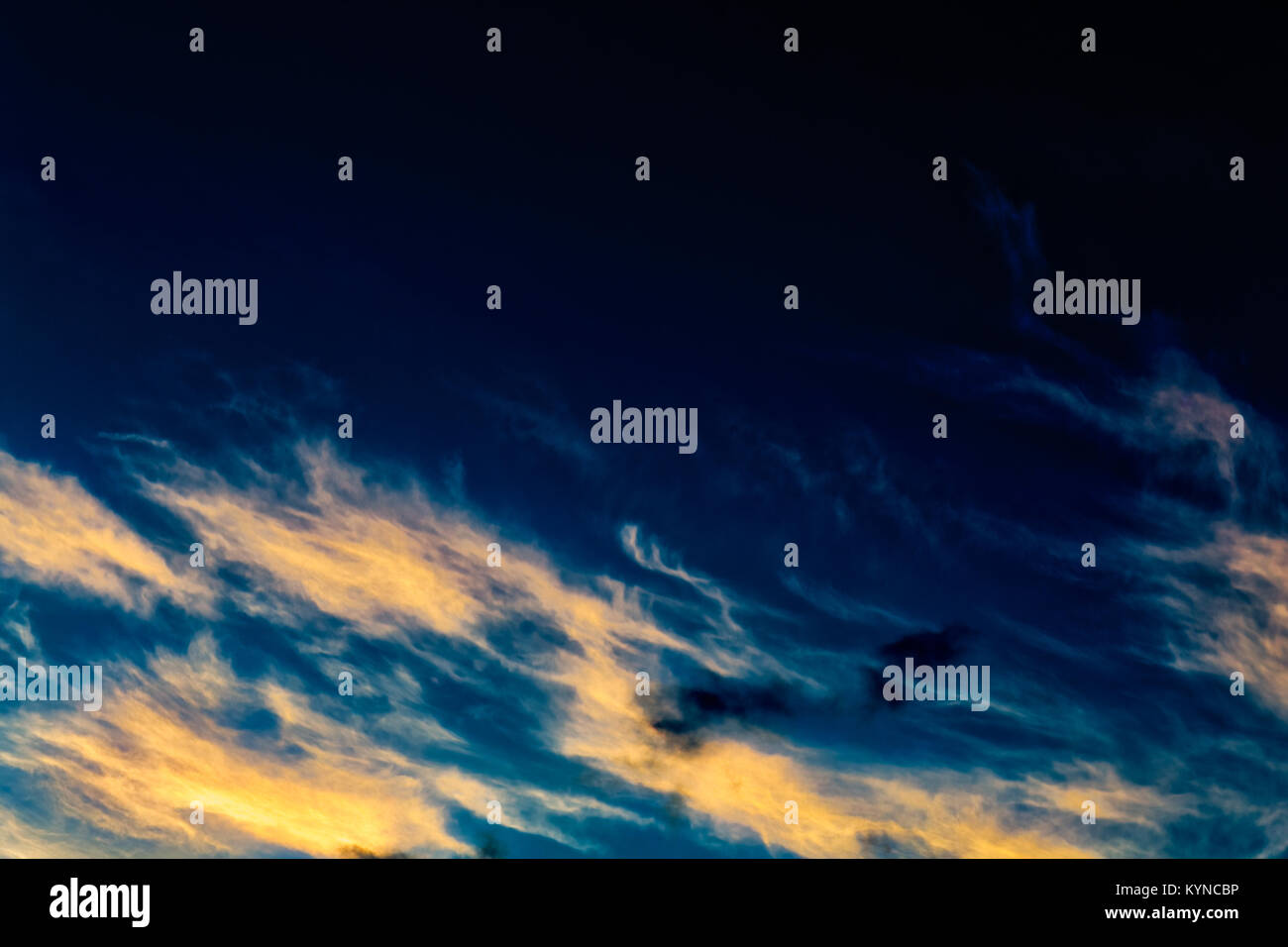 blue hour on clouds in sunset sky background Stock Photo - Alamy