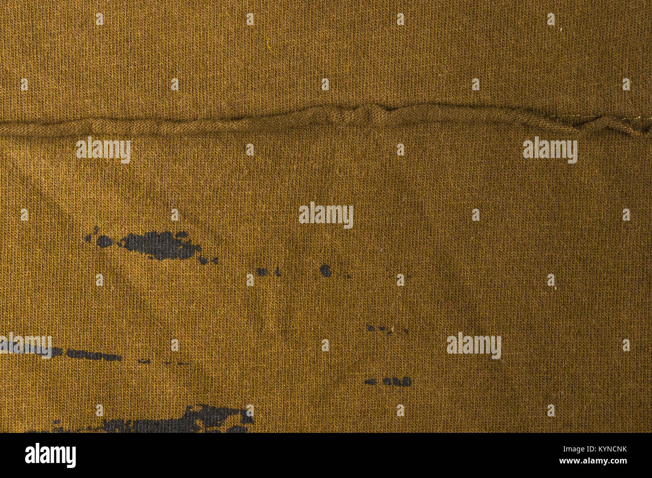 texture of the fabric is khaki with decorative seams and stitching ...