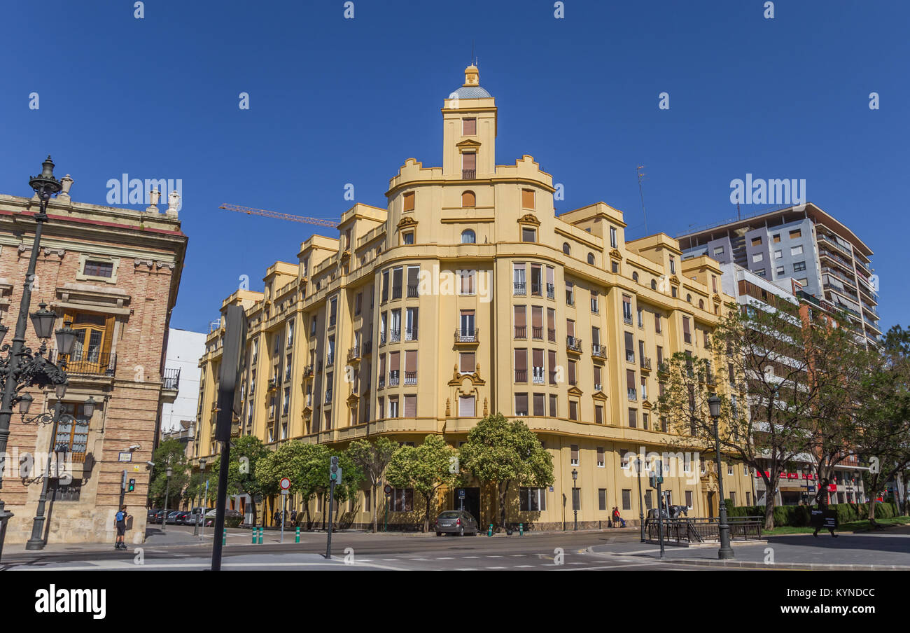 Yellow apartment building at the Tetuan square in Valencia, Spain Stock ...