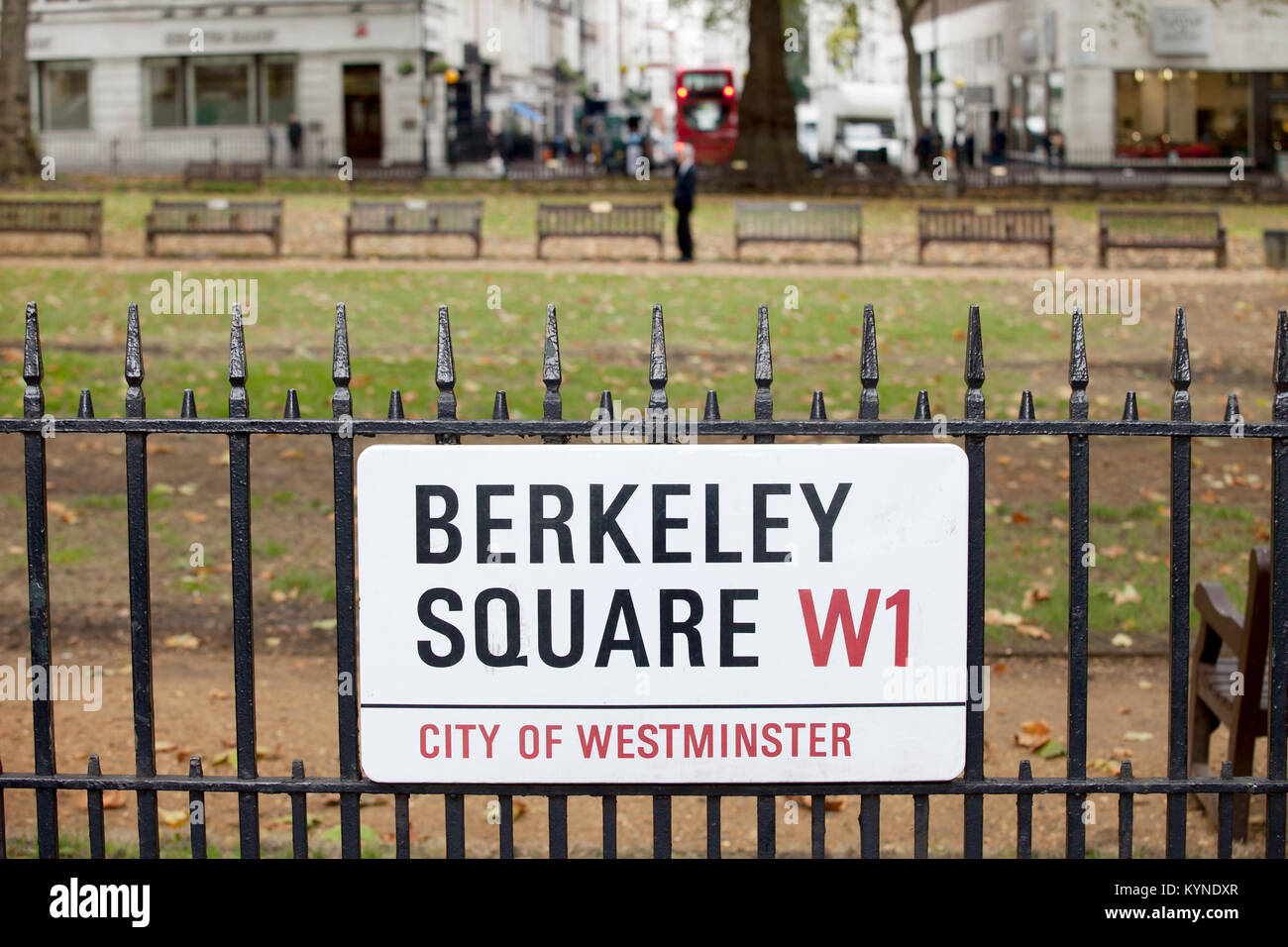Berkeley Square sign on railings with square behind Stock Photo - Alamy