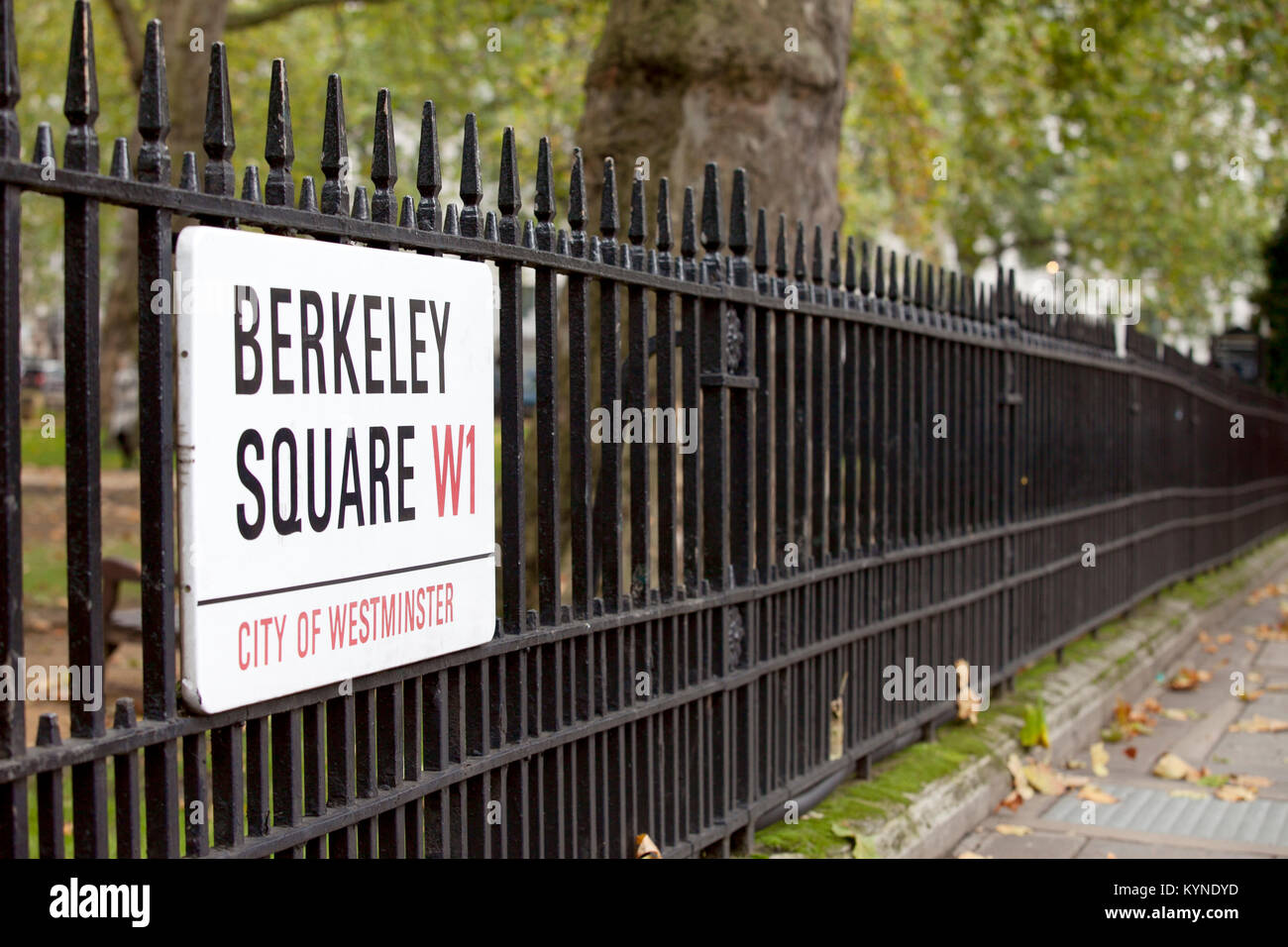 Berkeley Square sign on railings with square behind Stock Photo - Alamy
