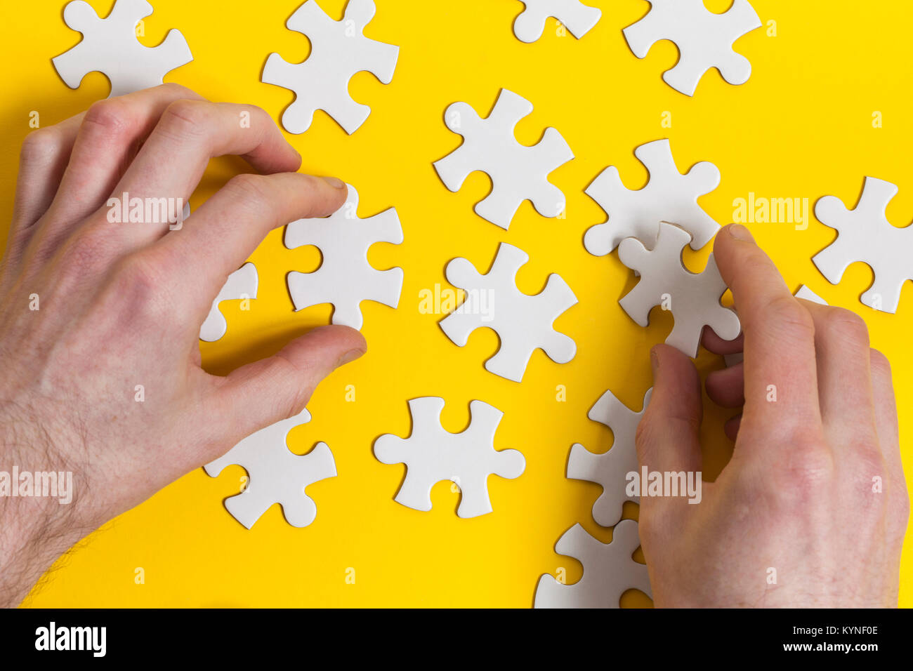 Jigsaw pieces being put together. Business solution concept Stock Photo ...