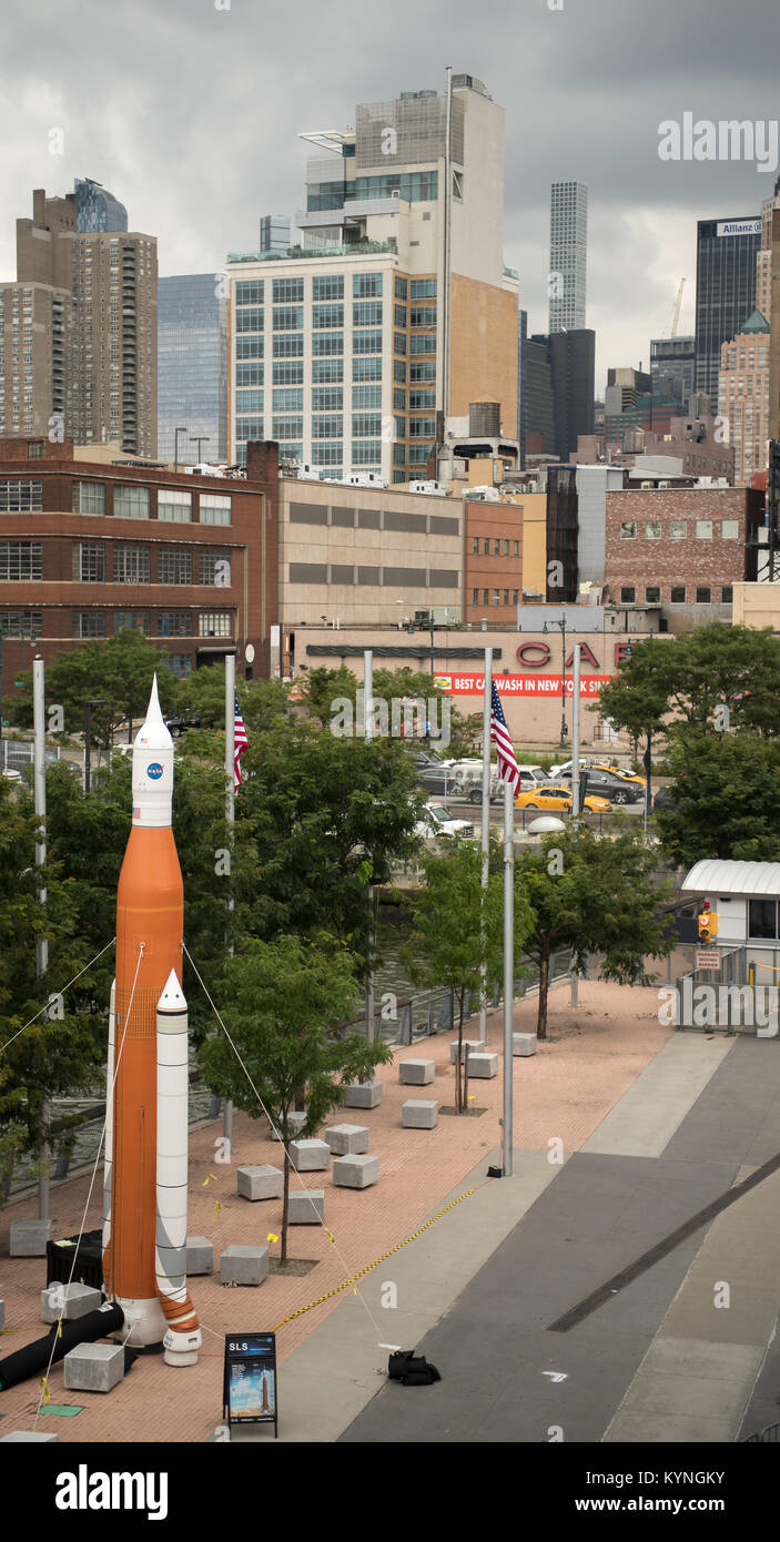 An inflatable scale model of the Space Launch System (SLS) rocket is ...