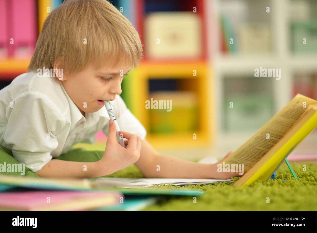 boy doing homework Stock Photo - Alamy