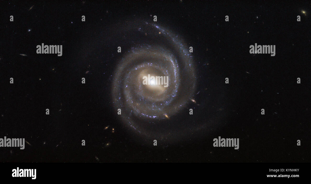 Hubble's image of the barred spiral galaxy UGC 6093 highlights its ...