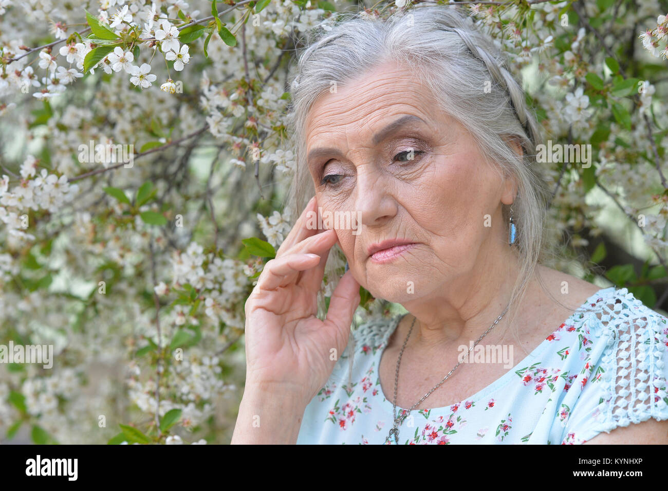 sad senior woman Stock Photo - Alamy