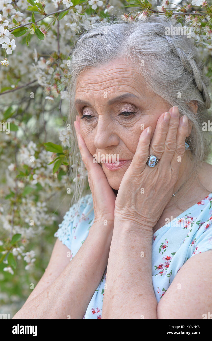 sad senior woman Stock Photo - Alamy
