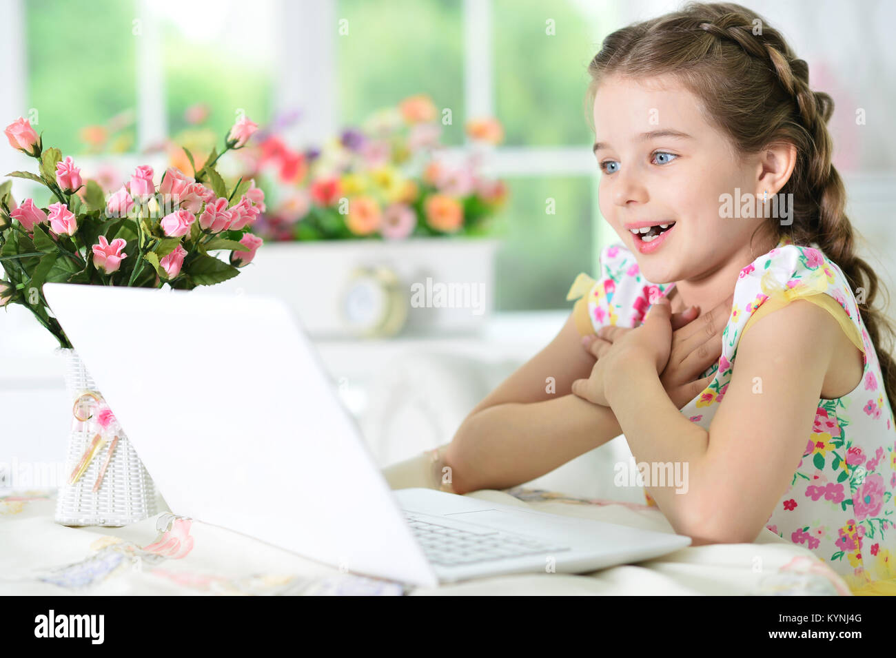 little girl using laptop Stock Photo - Alamy