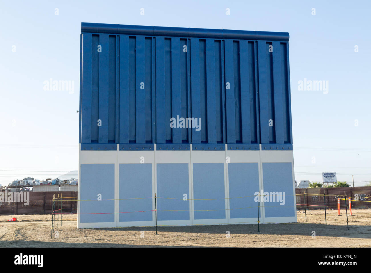 Ground-level views show the ongoing construction of various border wall ...