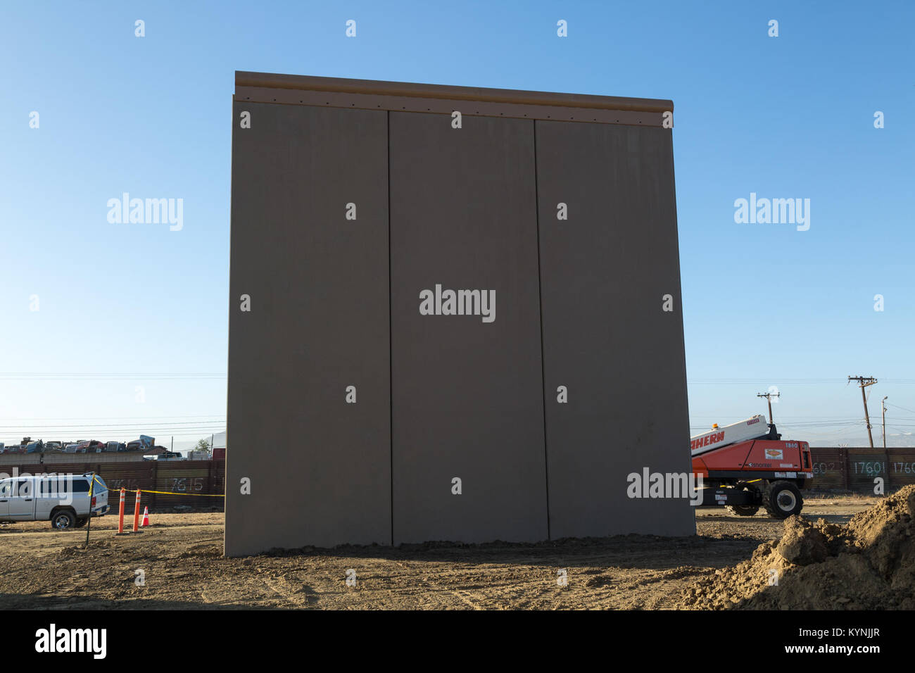 Photos taken during the Border Wall Prototype Construction Project show ...