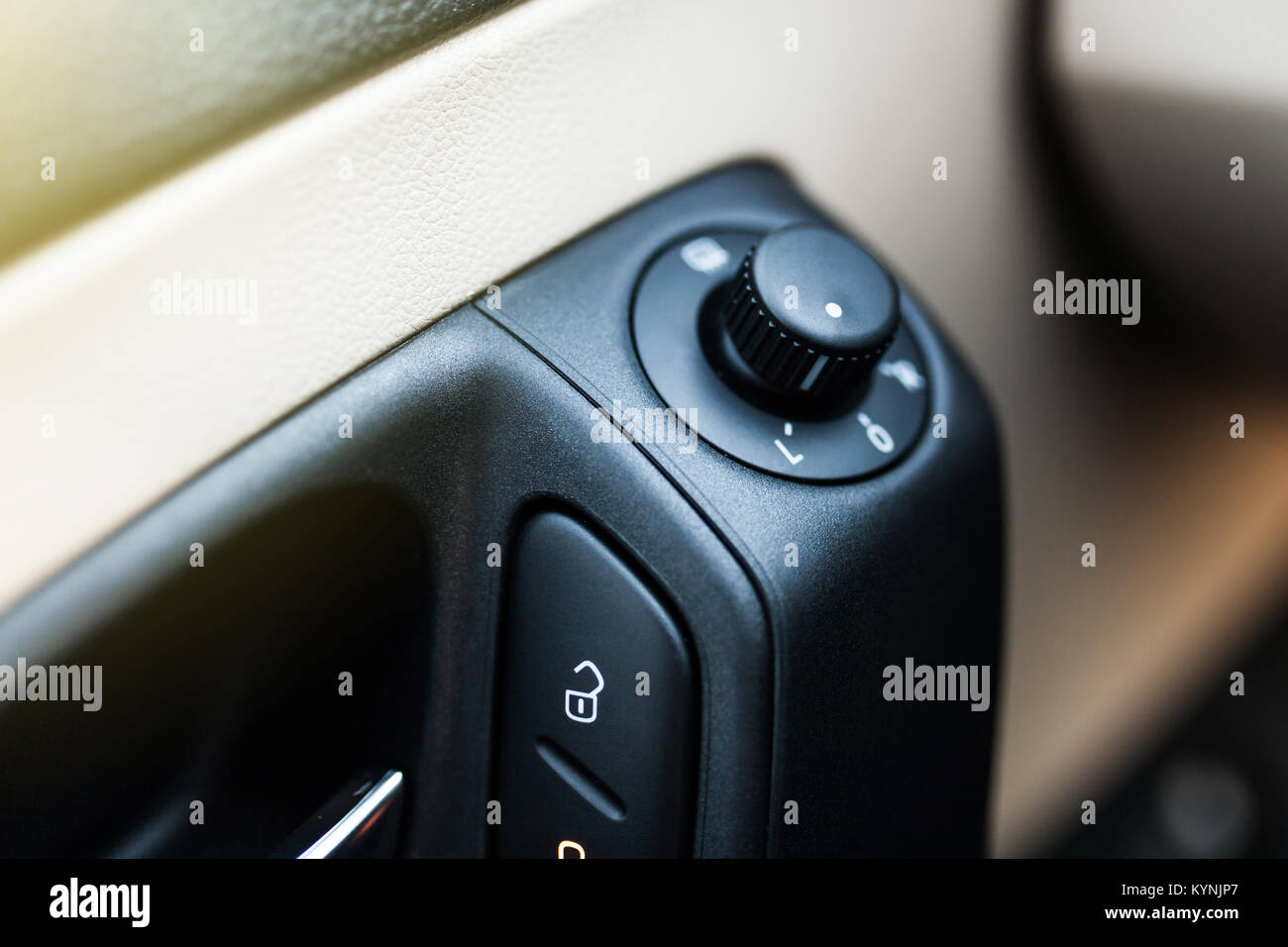 Mirror control buttons in a car Stock Photo - Alamy