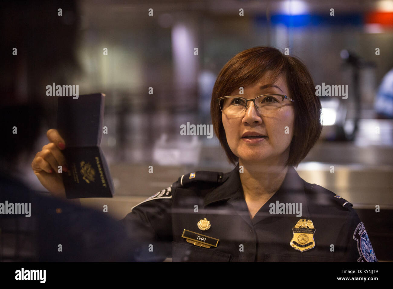 U.S. Customs and Border Protection officers process international ...