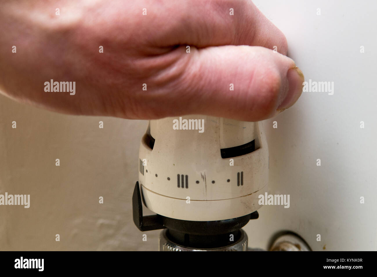Male hand turning dial hi-res stock photography and images - Alamy