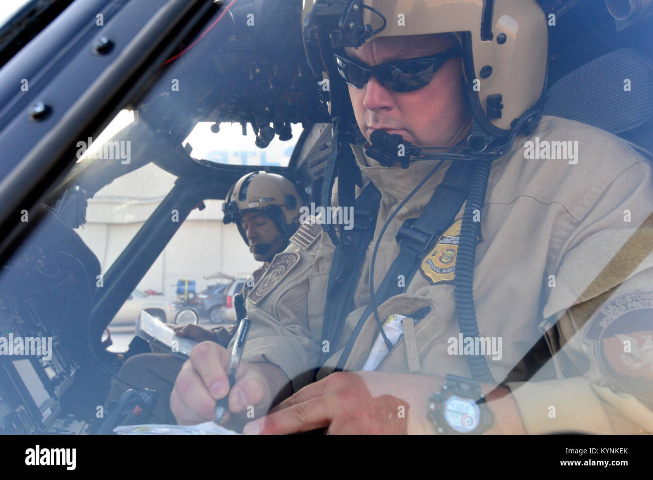 An Air and Marine Operations pilot performed preflight checks before ...