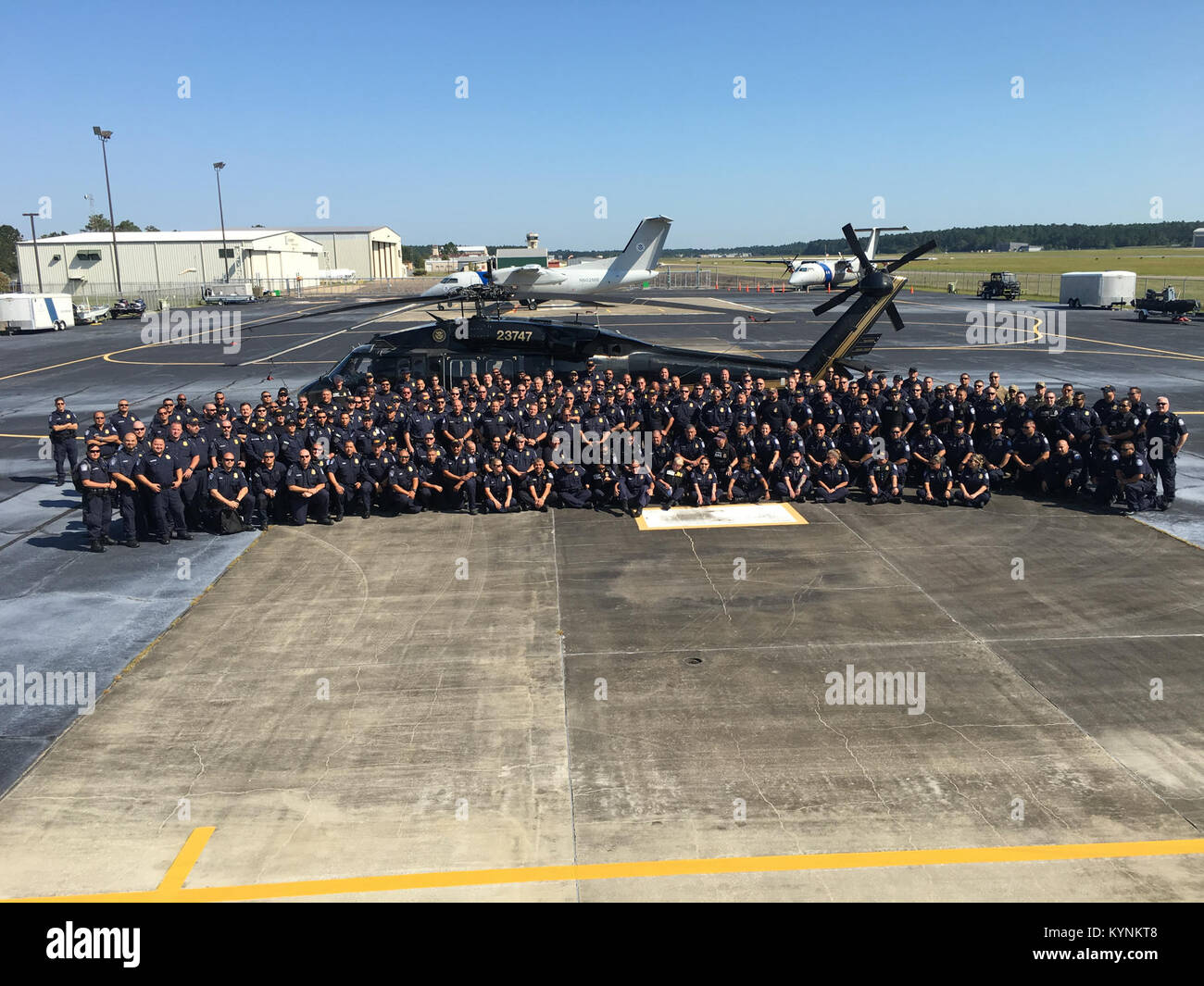 CBP Office of Field Operations personnel are staged in Hammond ...