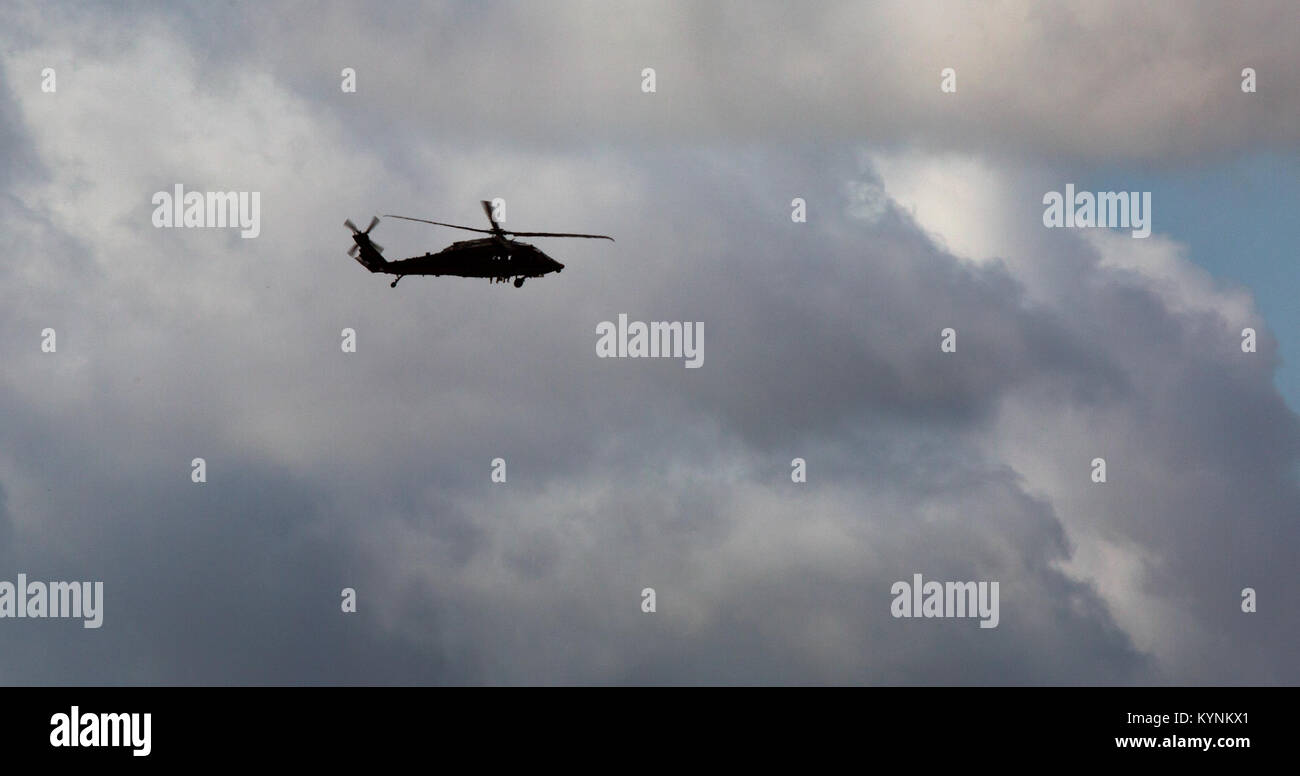 A CBP Blackhawk helicopter departs from Homestead, Florida, carrying ...