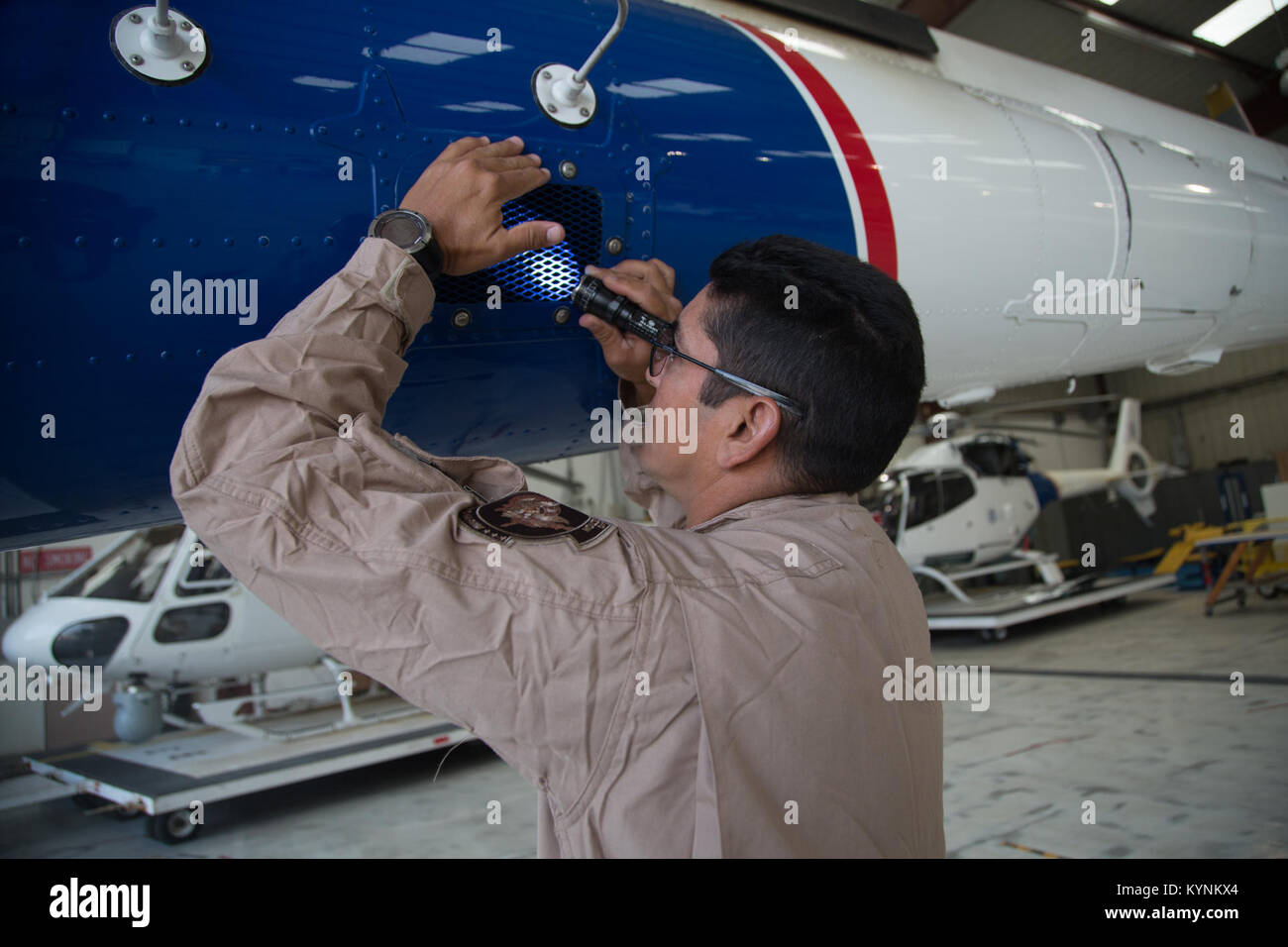 A CBP Air and Marine Operations pilot from Laredo, Texas, performs a ...