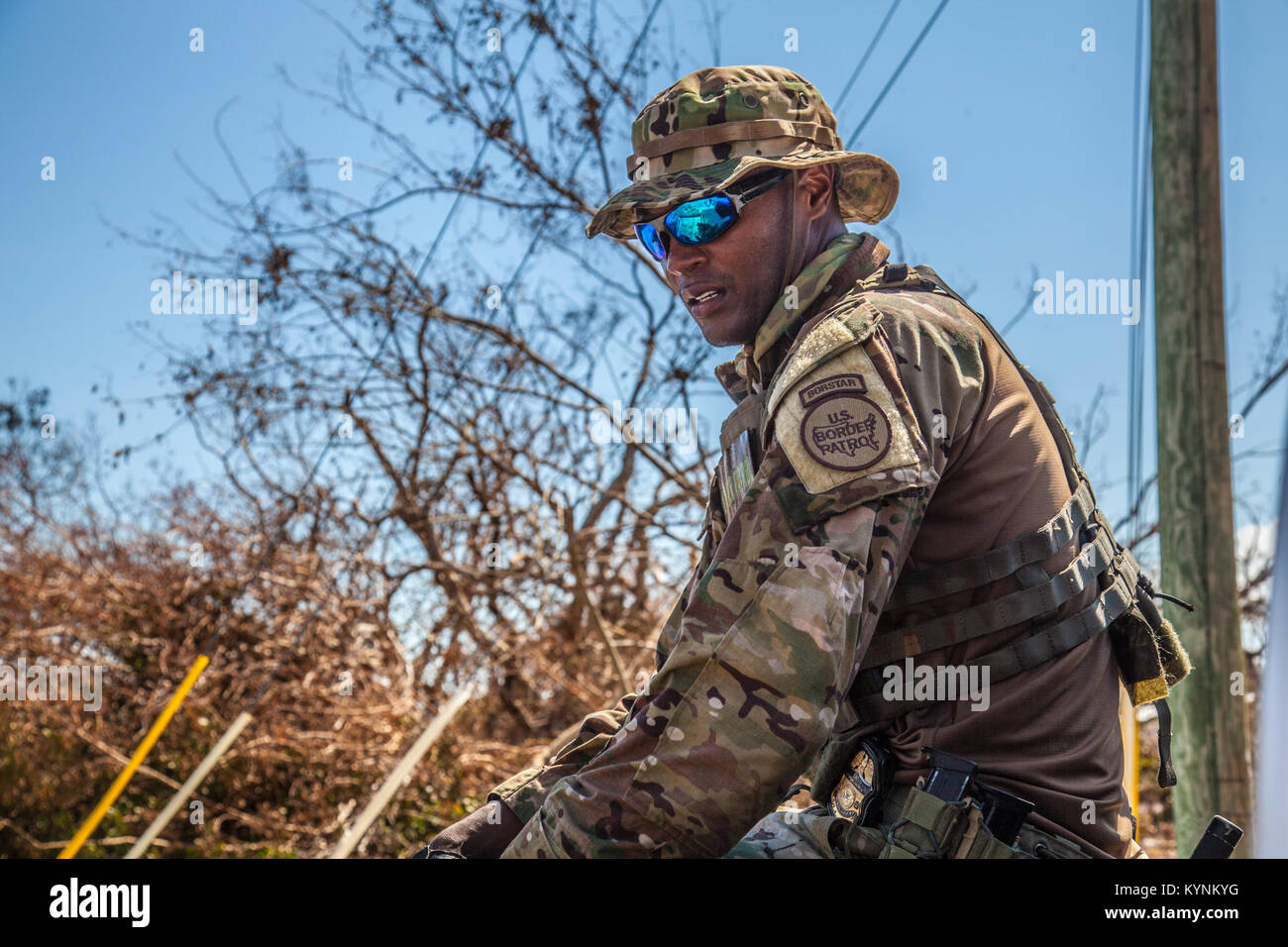 A BORSTAR Agent takes a break after clearing debris from a truck in Big ...