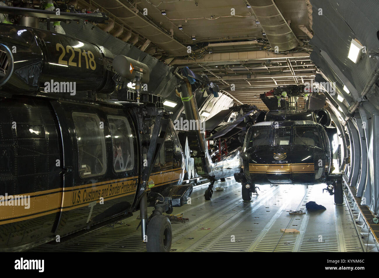 PAE maintenance staff and U.S. Air Force personnel work together to ...