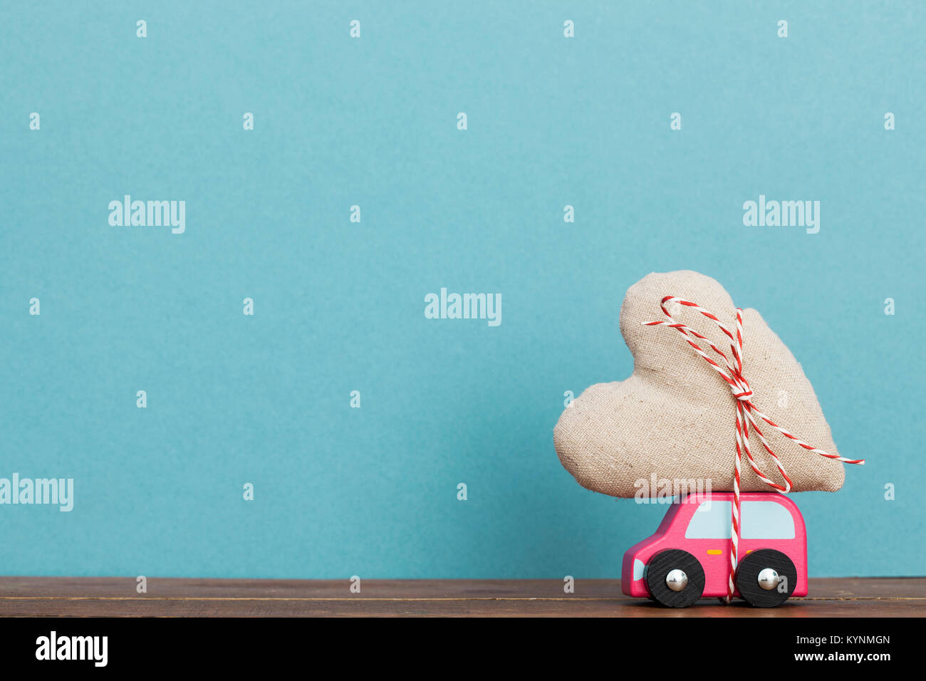 Wooden toy car heart roof hi-res stock photography and images - Alamy