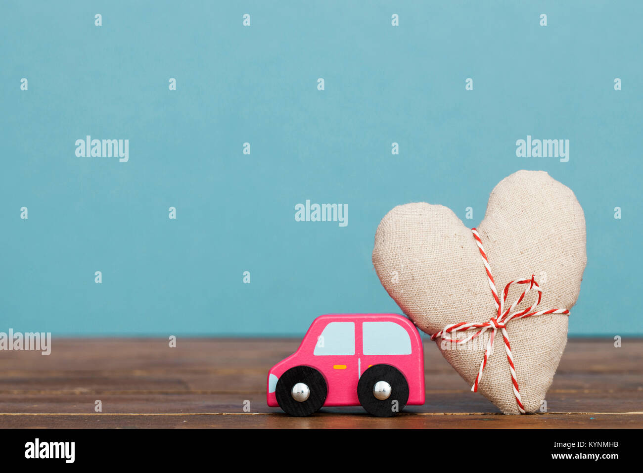 Wooden toy car heart roof hi-res stock photography and images - Alamy