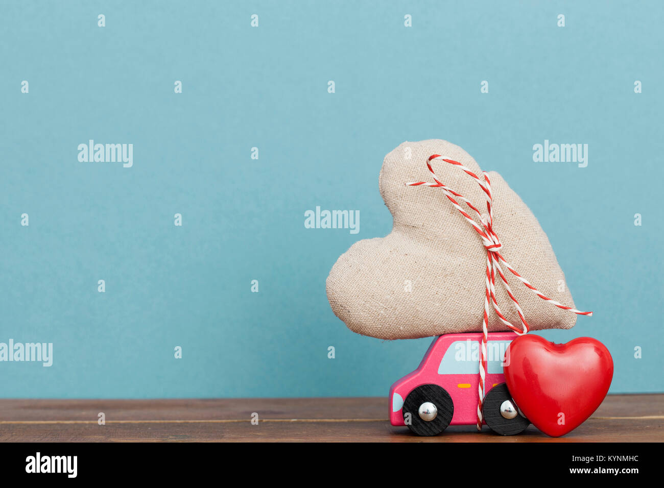 Wooden toy car heart roof hi-res stock photography and images - Alamy