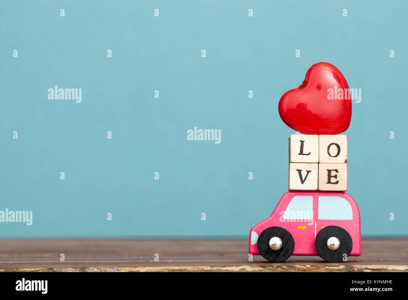 Wooden toy car heart roof hi-res stock photography and images - Alamy