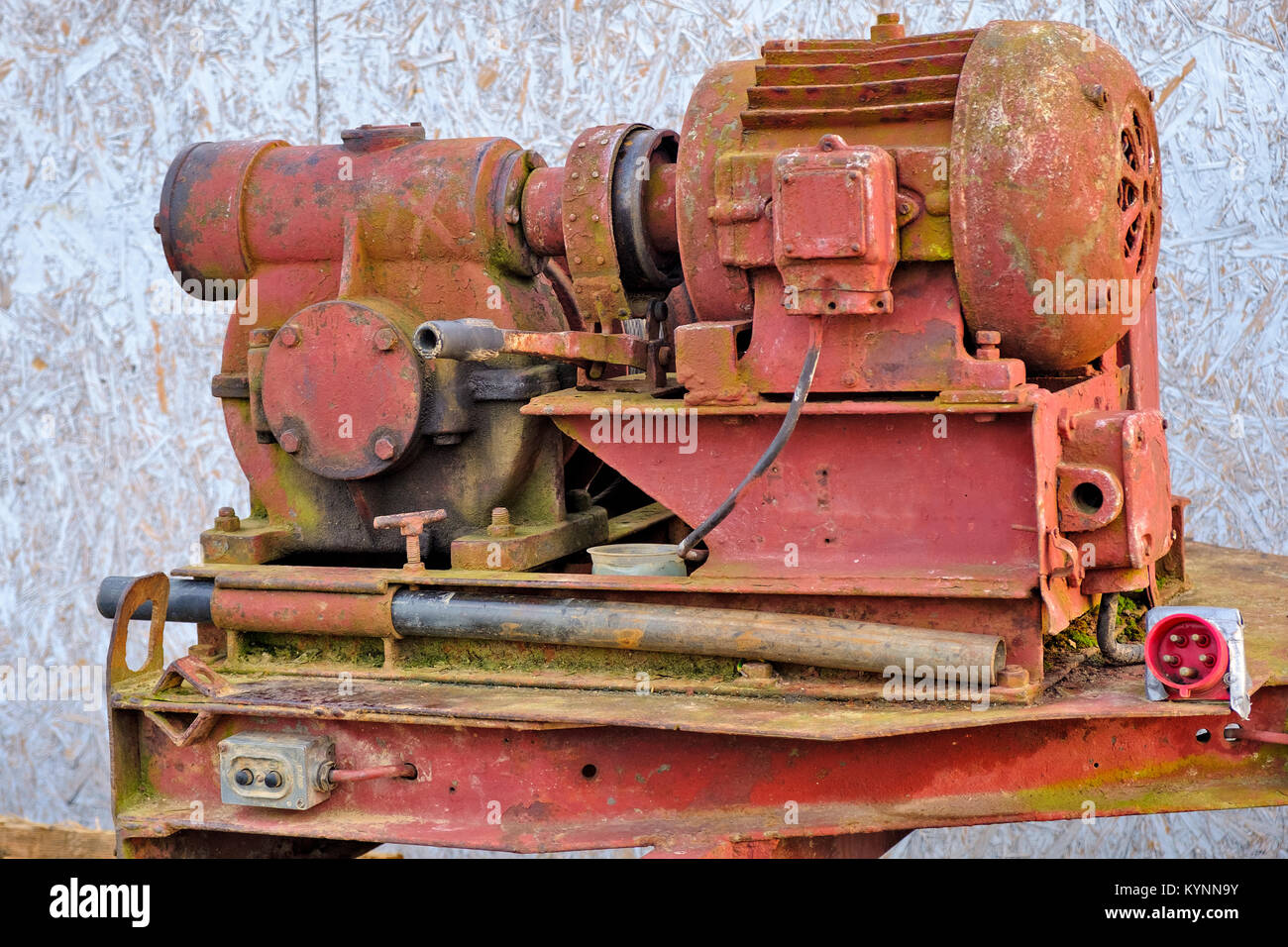 Worn vintage electric power machinery on a massive platform in ...