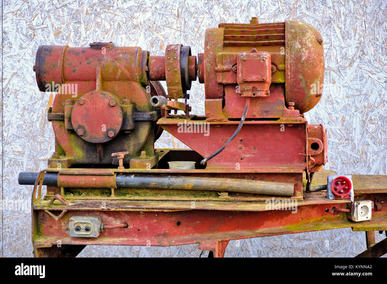 Worn vintage electric power machinery on a massive platform in ...