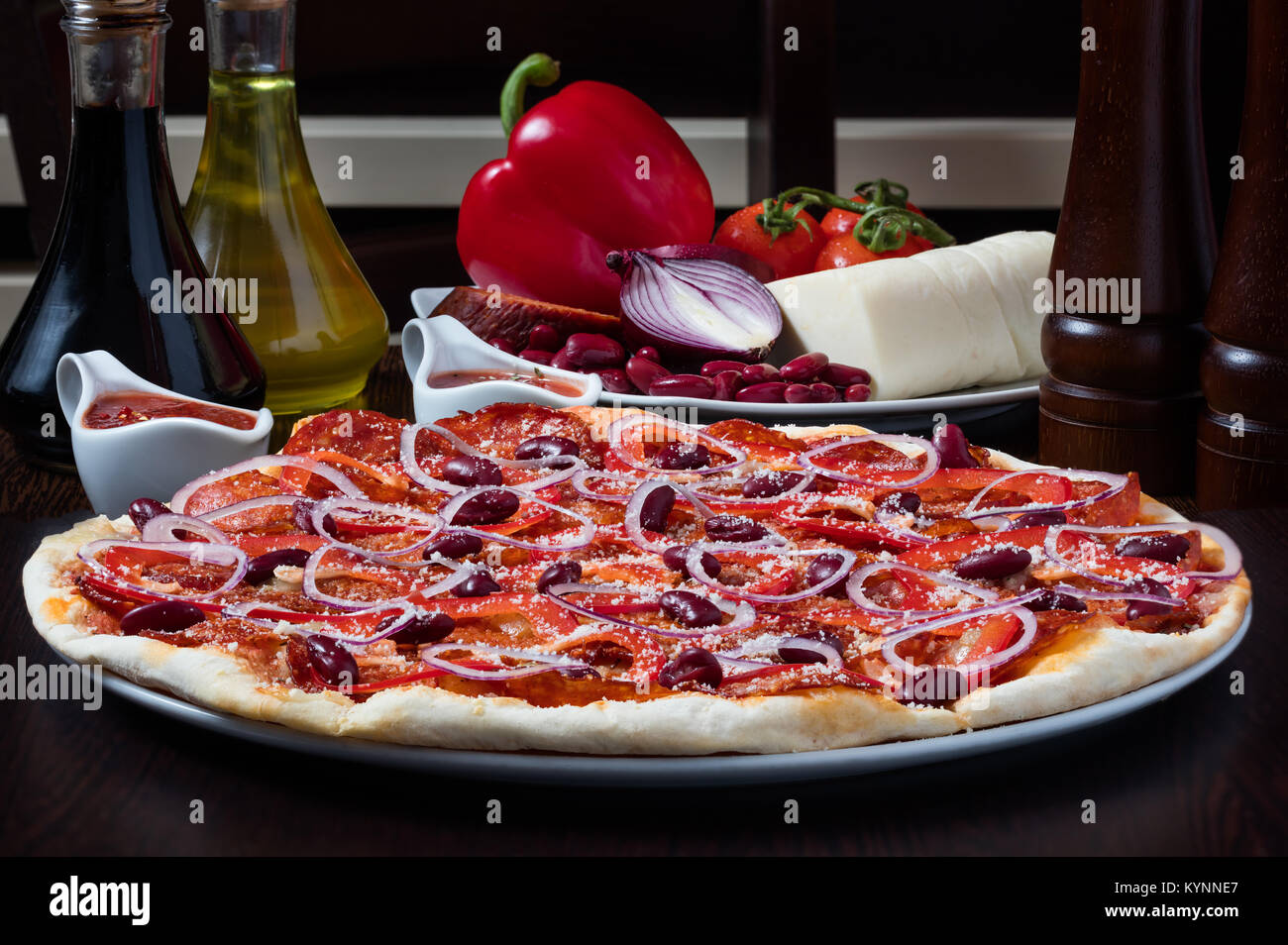 pizza with pepperoni and beans Stock Photo - Alamy