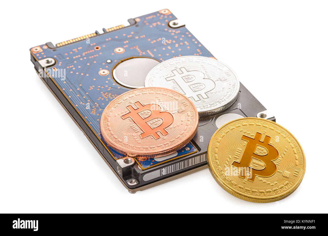 virtual coins bitcoin lie on hard drive isolated on white background ...