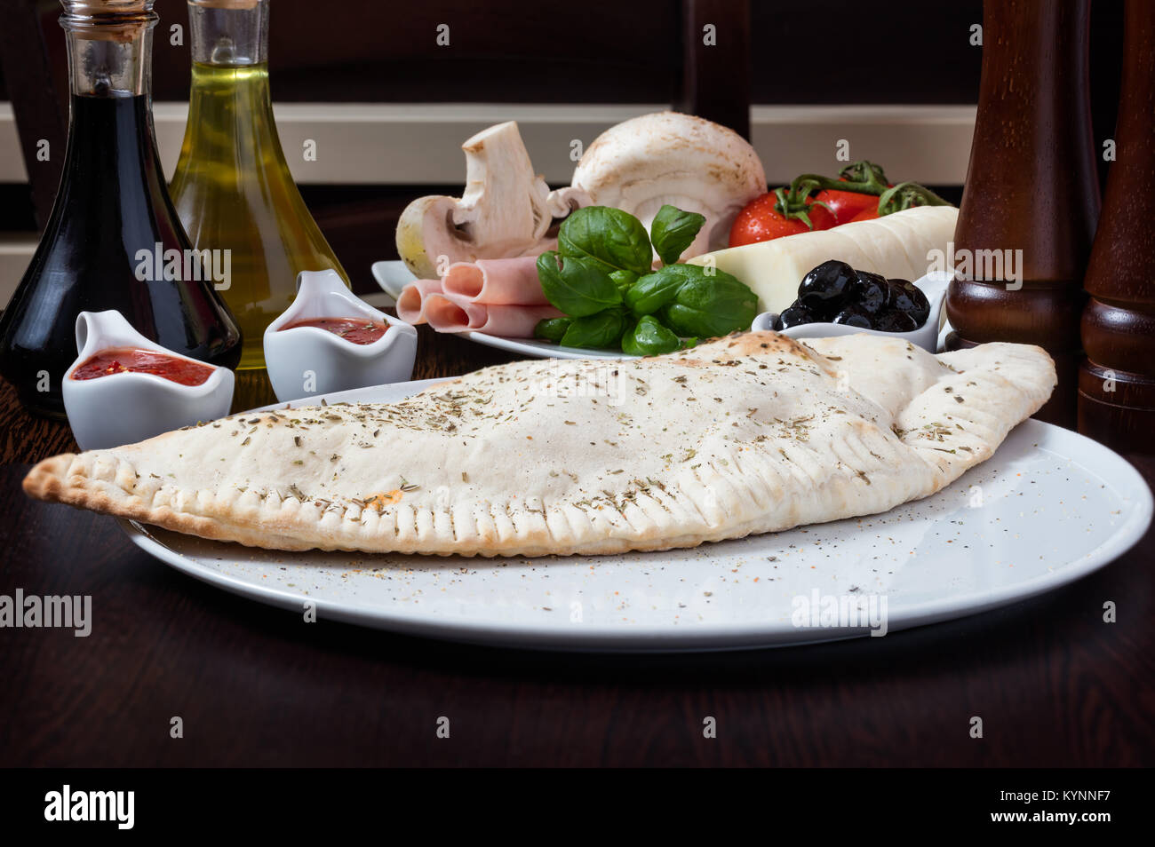 Pizza calzone hi-res stock photography and images - Alamy