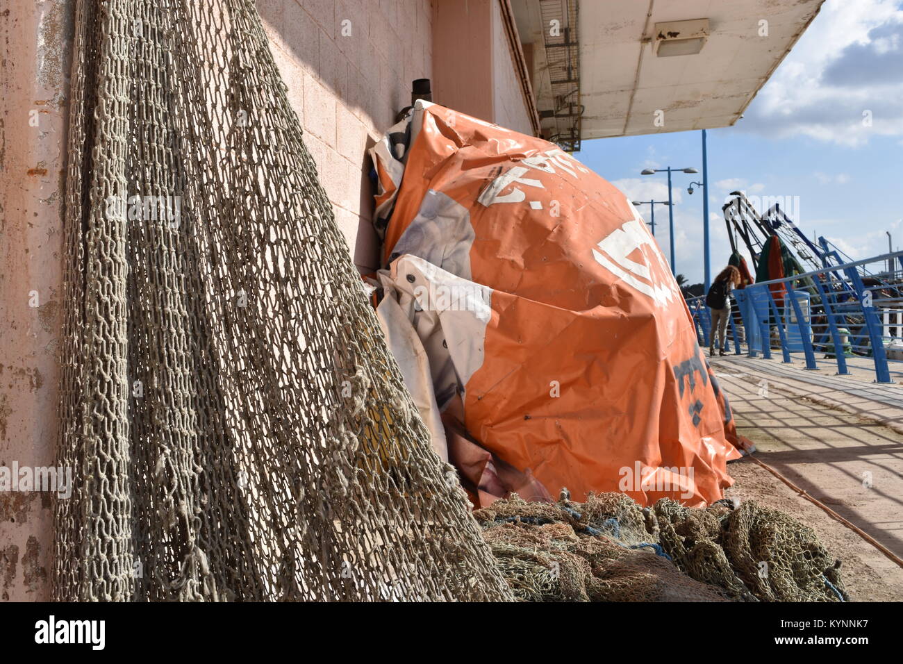Fishing nets at the harbor Stock Photo - Alamy