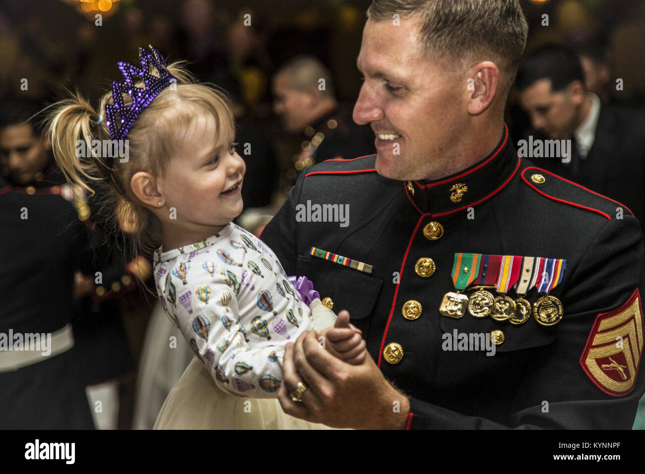 Marine Corps Staff Sgt. Christopher M. Bess dances with his 2-year-old ...