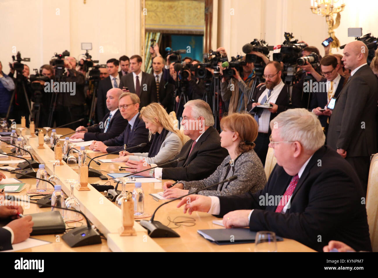 Members of the U.S. delegation listen attentively as Russian Foreign ...