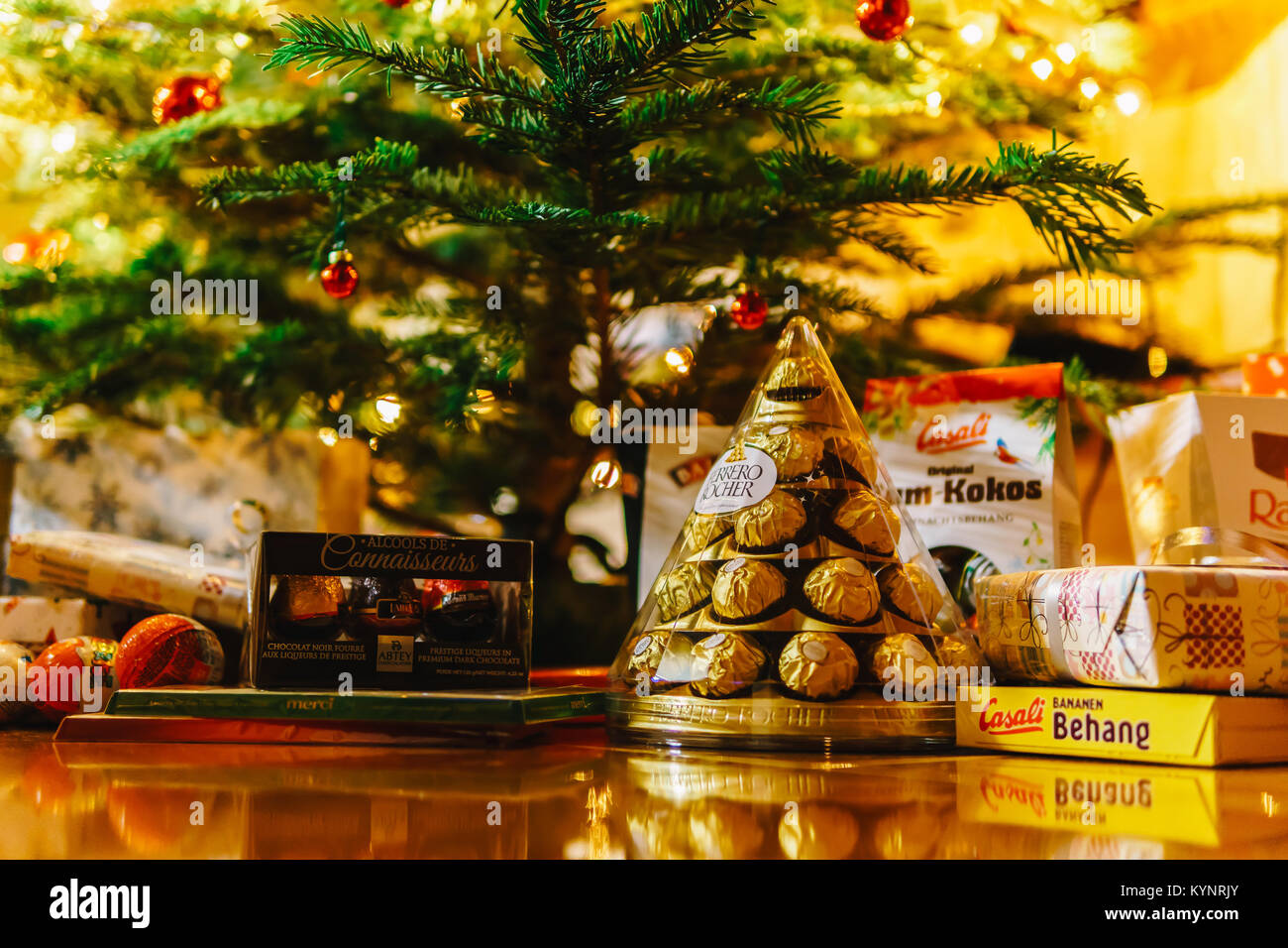 BUCHAREST, ROMANIA - DECEMBER 24, 2017: Presents And Chocolate Candies ...
