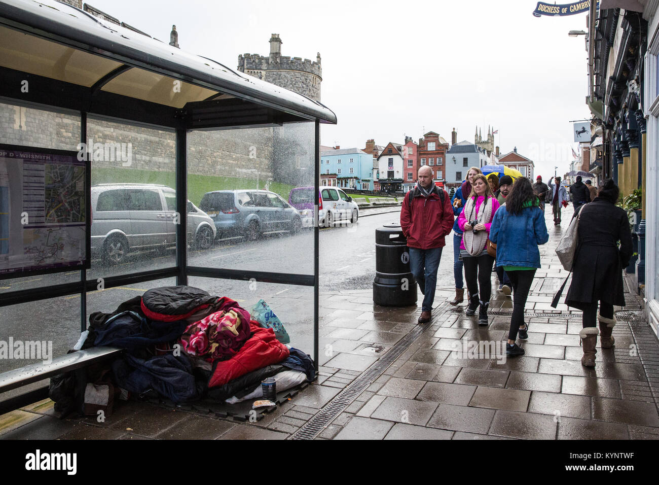 Windsor, UK. 15th Jan, 2018. A homeless person sleeps under a bus ...