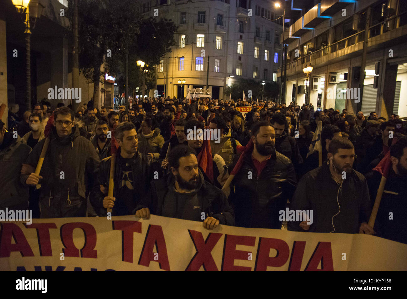 Athens, Greece. 15th Jan, 2018. Protesters march shouting slogans ...