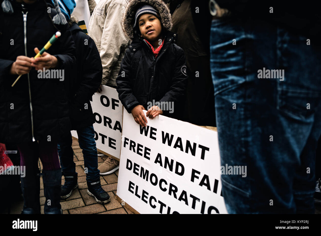 Child protesting with placard hi-res stock photography and images - Alamy
