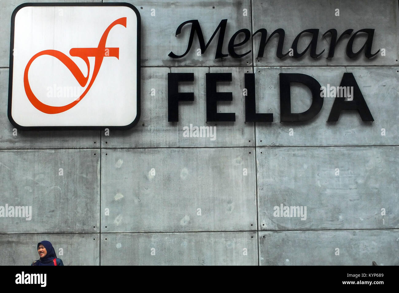 KUALA LUMPUR, MALAYSIA - JANUARY 16: A women stand infront of the Felda ...