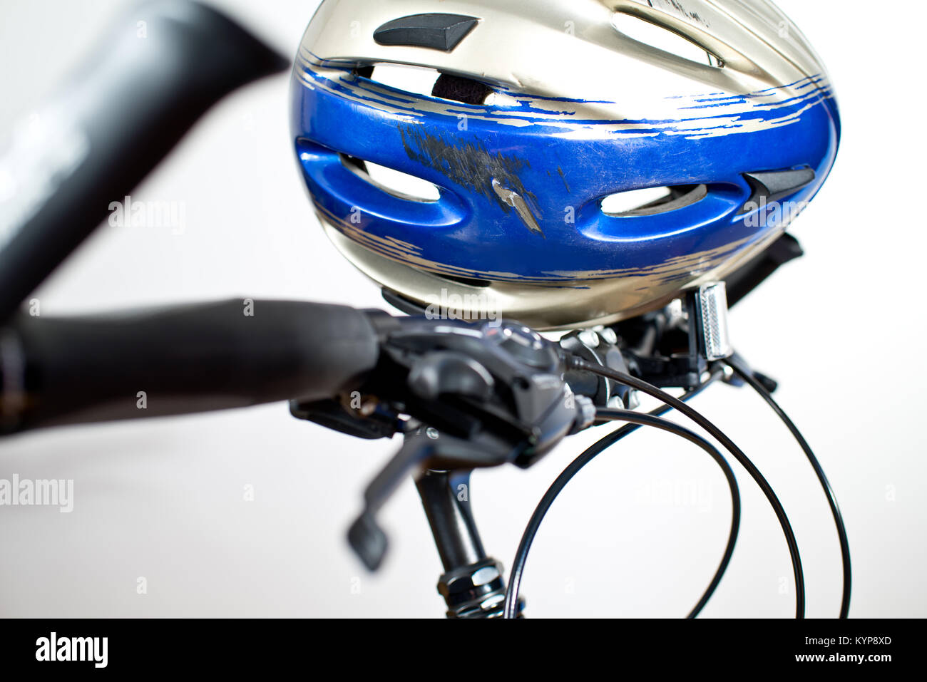 Old Scraped Safety Helmet On The Bike Stock Photo - Alamy